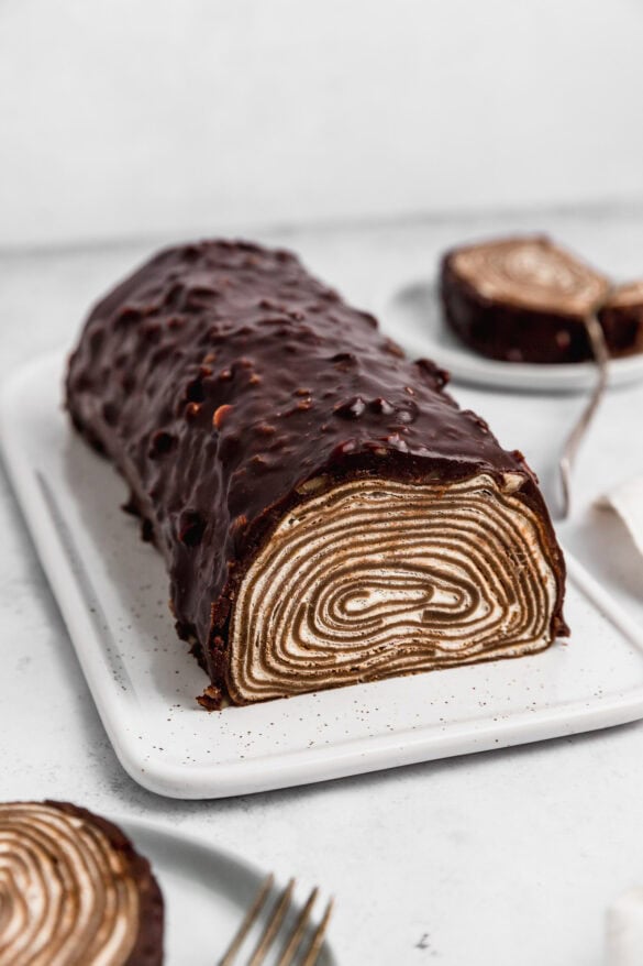 Chocolate Crepe Roll Cake Covered in Ganache | Cravings Journal